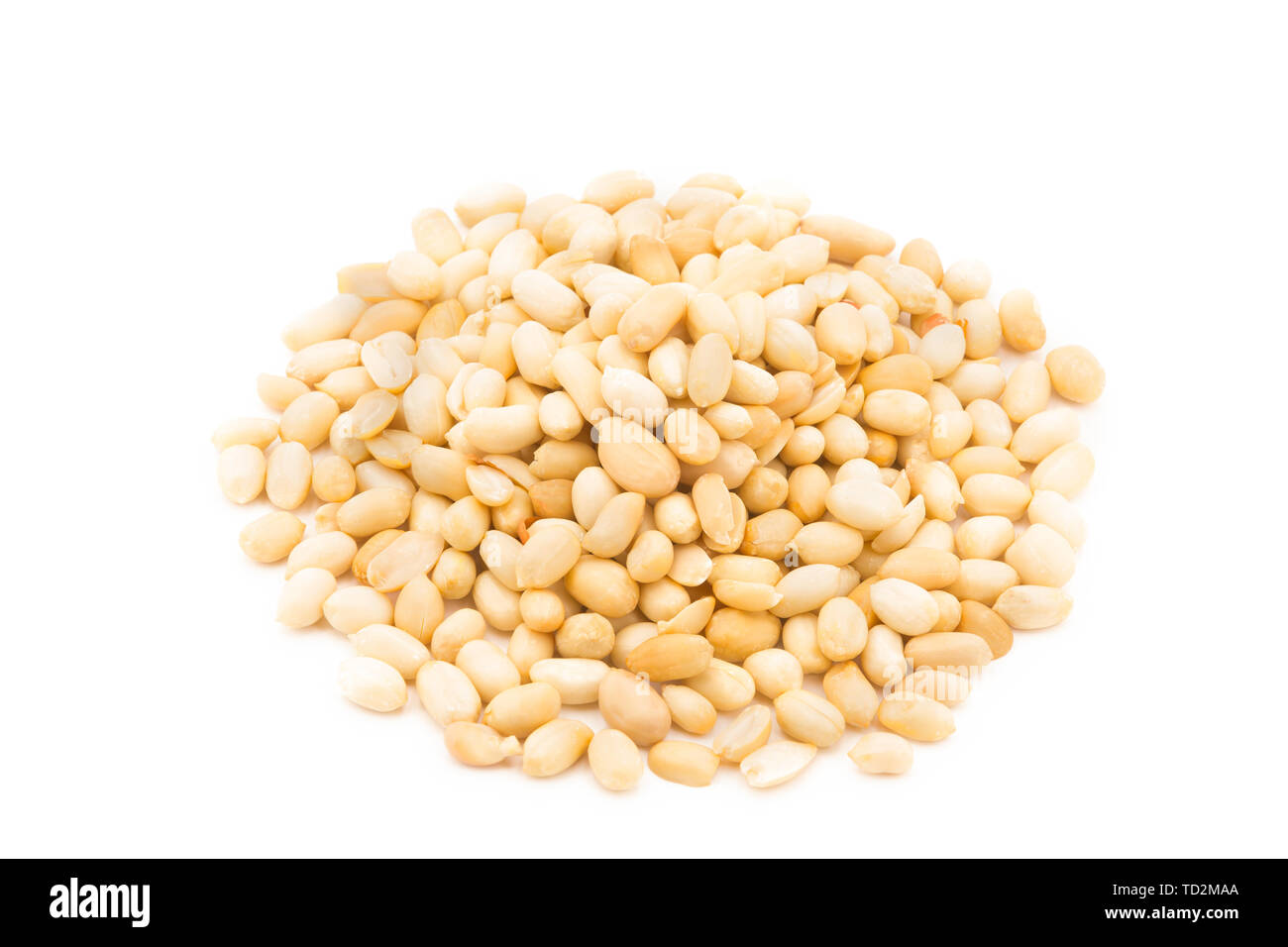 Peeling peanuts on white background Stock Photo - Alamy