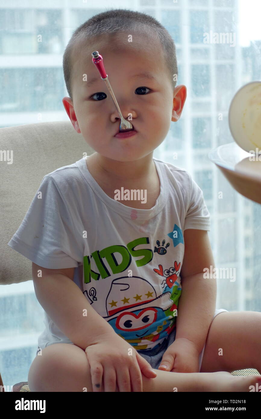 Boy who didn't eat enough ice cream Stock Photo - Alamy