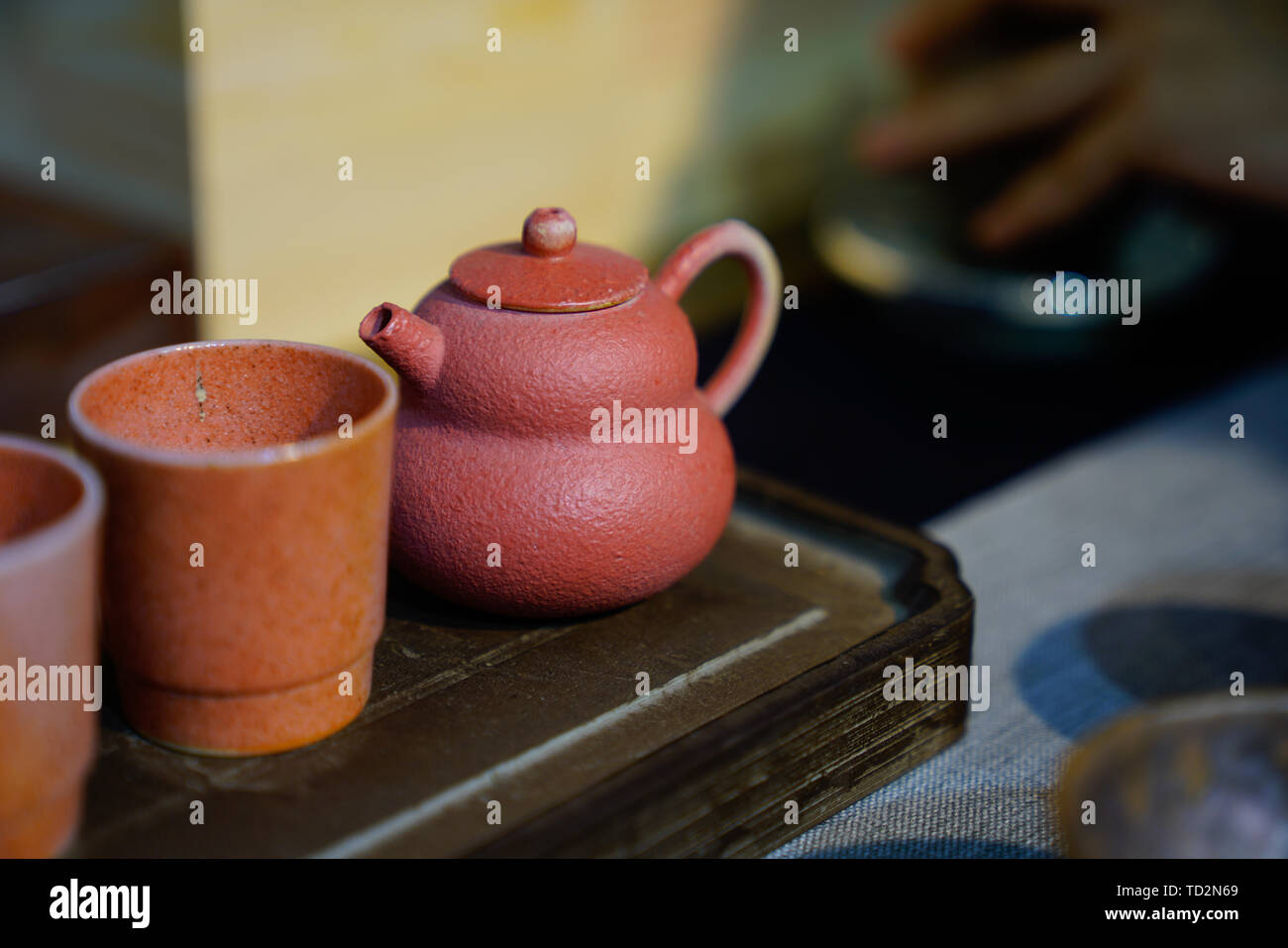 Red mud teapot Stock Photo - Alamy
