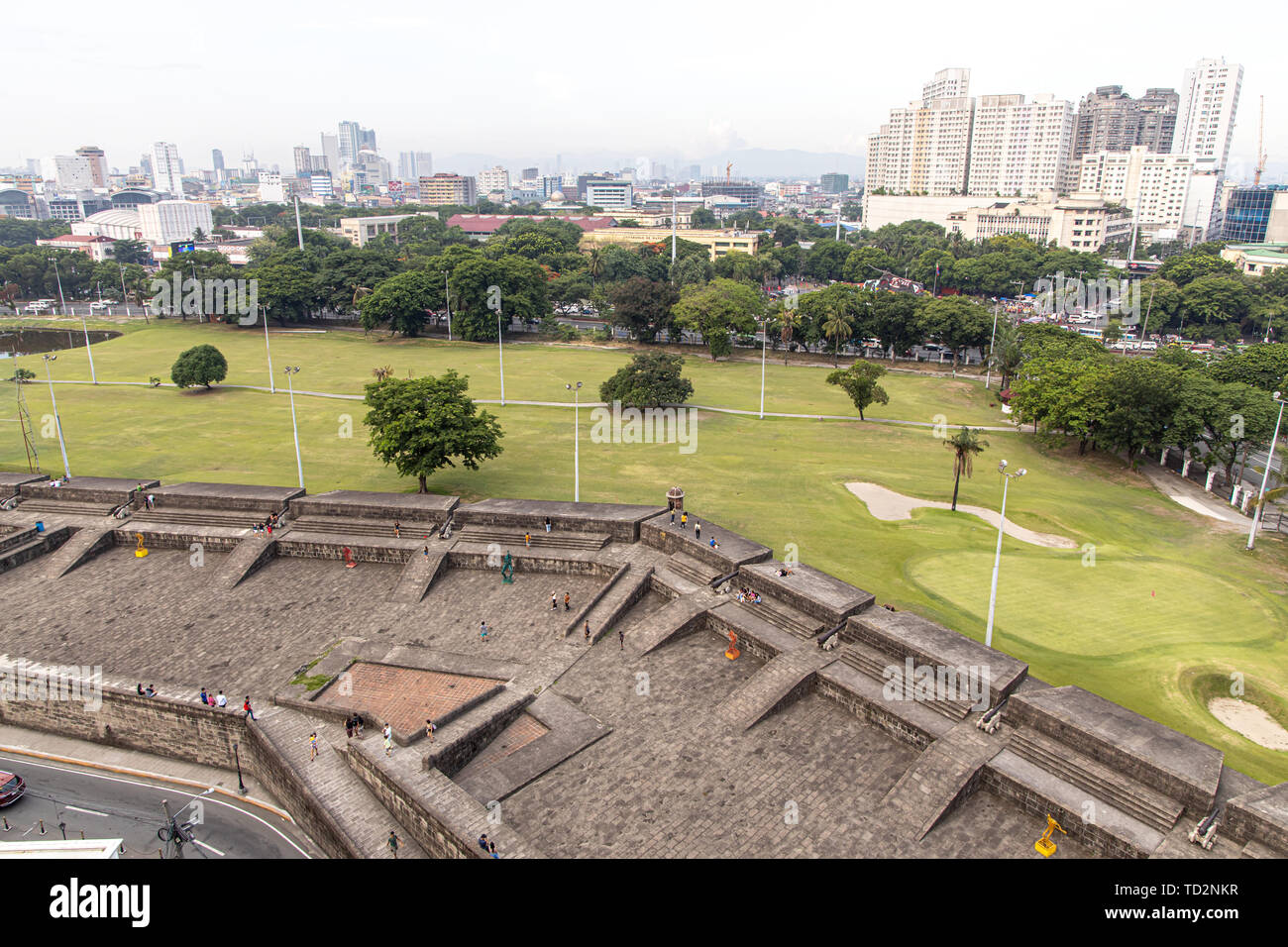 People on the Intramuros wall, Manila, Philippines Stock Photo - Alamy