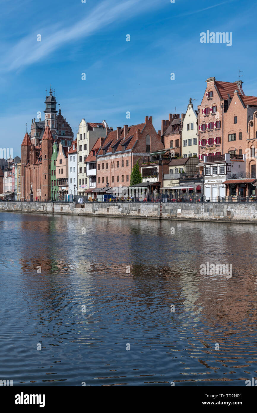 Iconic waterfront of Gdansk. Some of the buildings date back to the ...