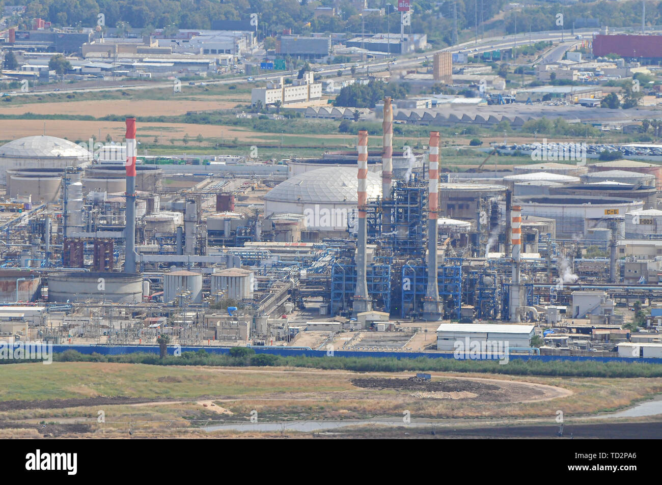 Israel, Haifa bay, the flues and chimneys of the Petrochemical factory ...