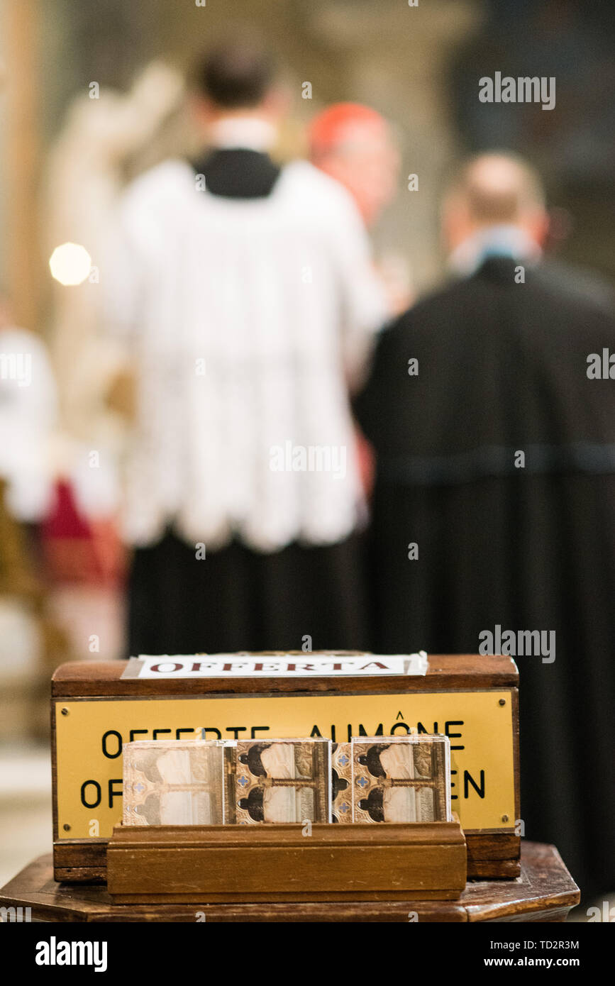 box for offerings in the Catholic church in the background prelates ...