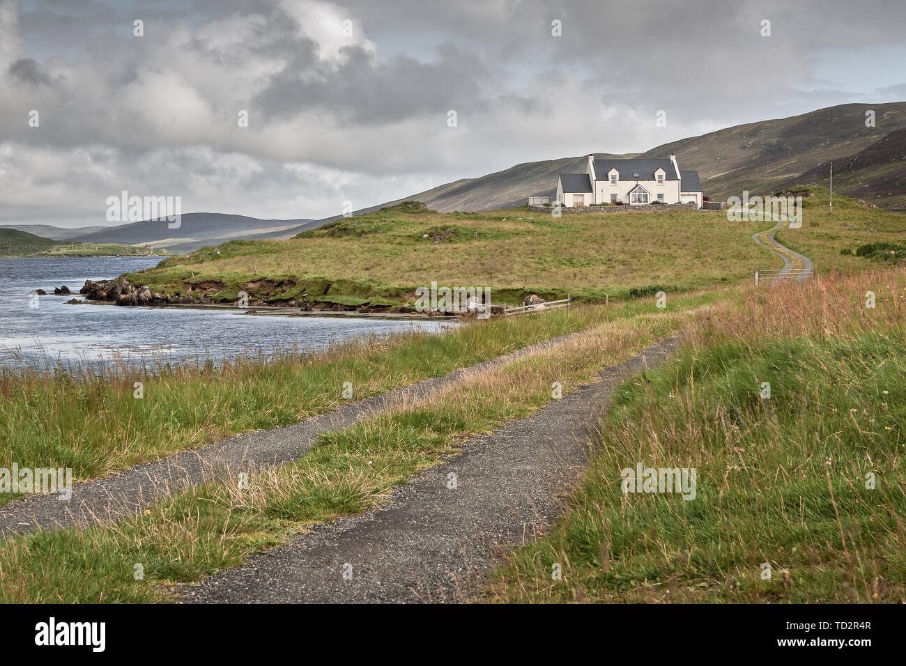 A white remote house in Whiteness in the Shetland Isles, North of ...