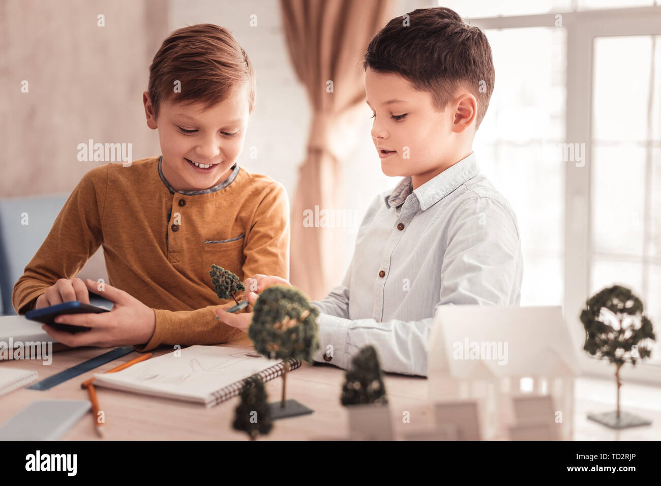 Two curious smart schoolboys studying ecology Stock Photo - Alamy