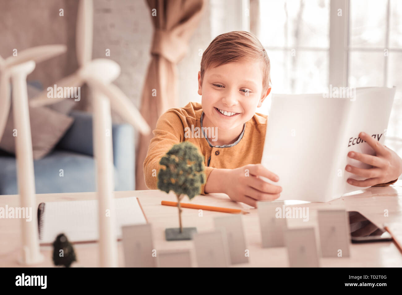 Smiling pupil feeling amazing while enjoying studying ecology Stock ...