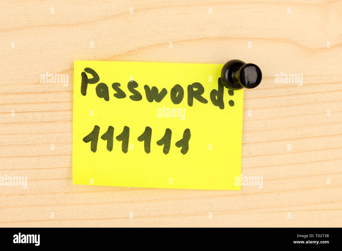 Sticker-reminder with most popular password, on wooden background Stock ...
