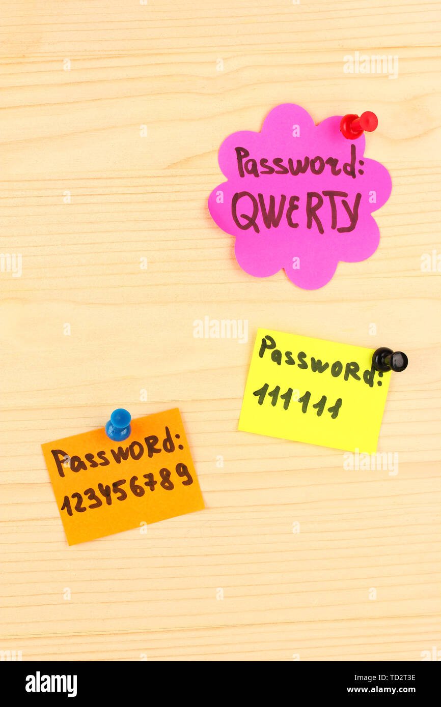 Stickers-reminders with most popular passwords, on wooden background ...