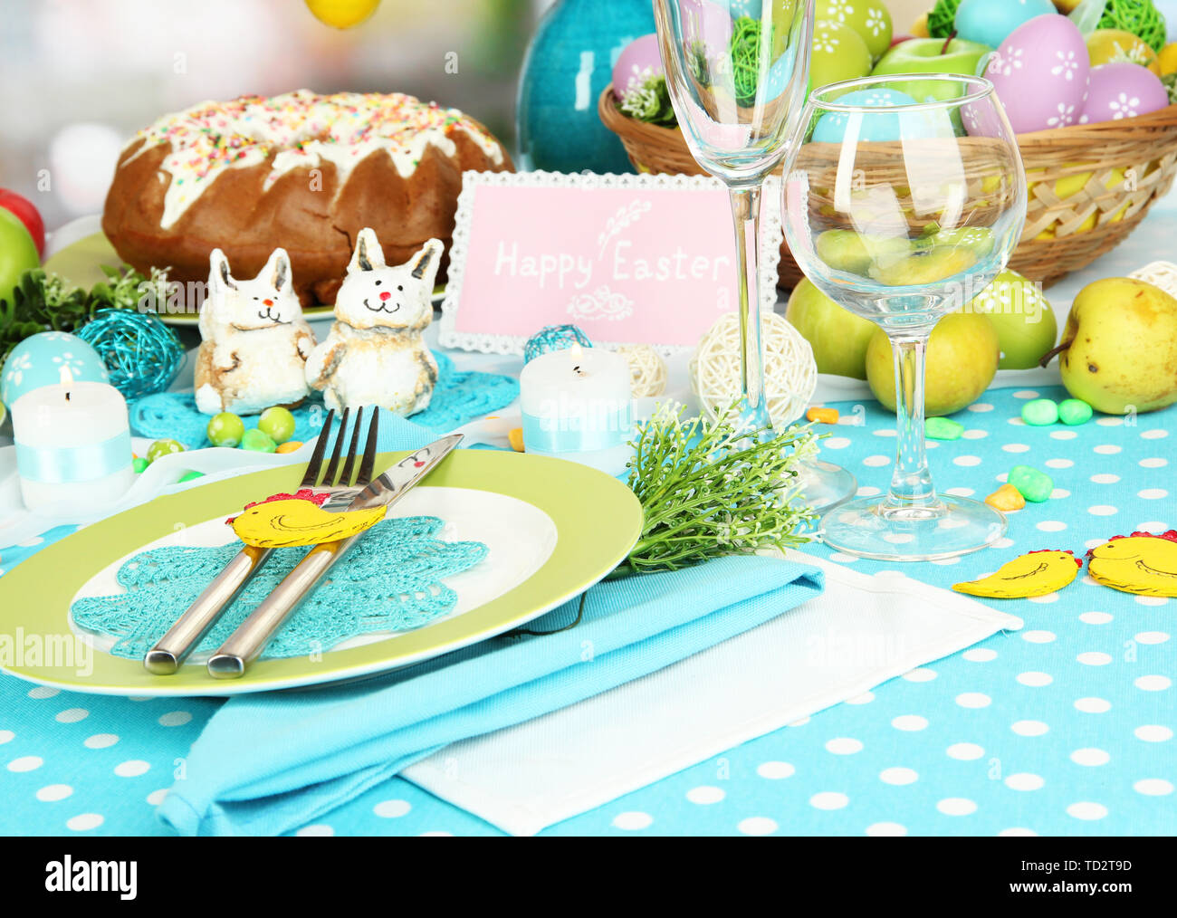 Serving Easter table on room background Stock Photo - Alamy