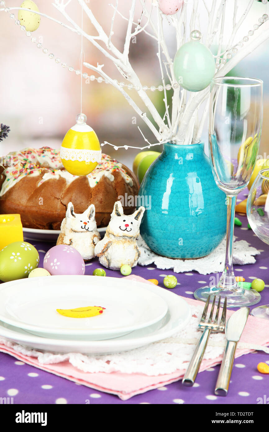 Serving Easter table on room background Stock Photo - Alamy