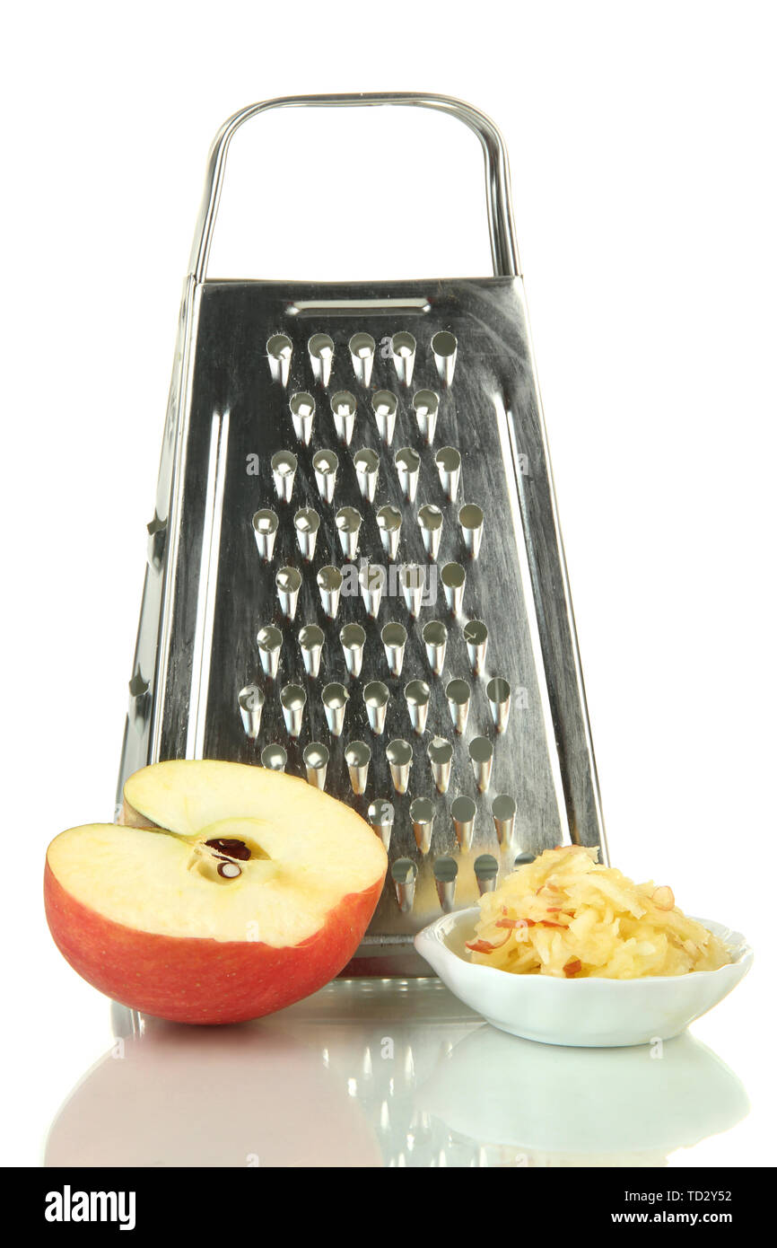 Metal grater and apple, isolated on white Stock Photo - Alamy