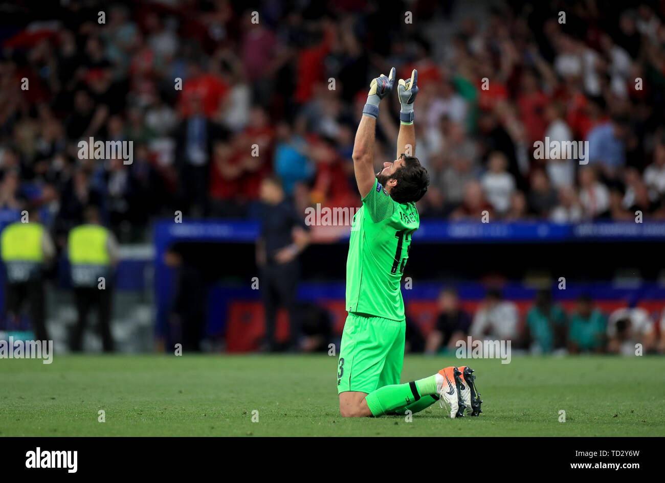 Liverpool goalkeeper Alisson Becker celebrates team mate Divock Origi's ...