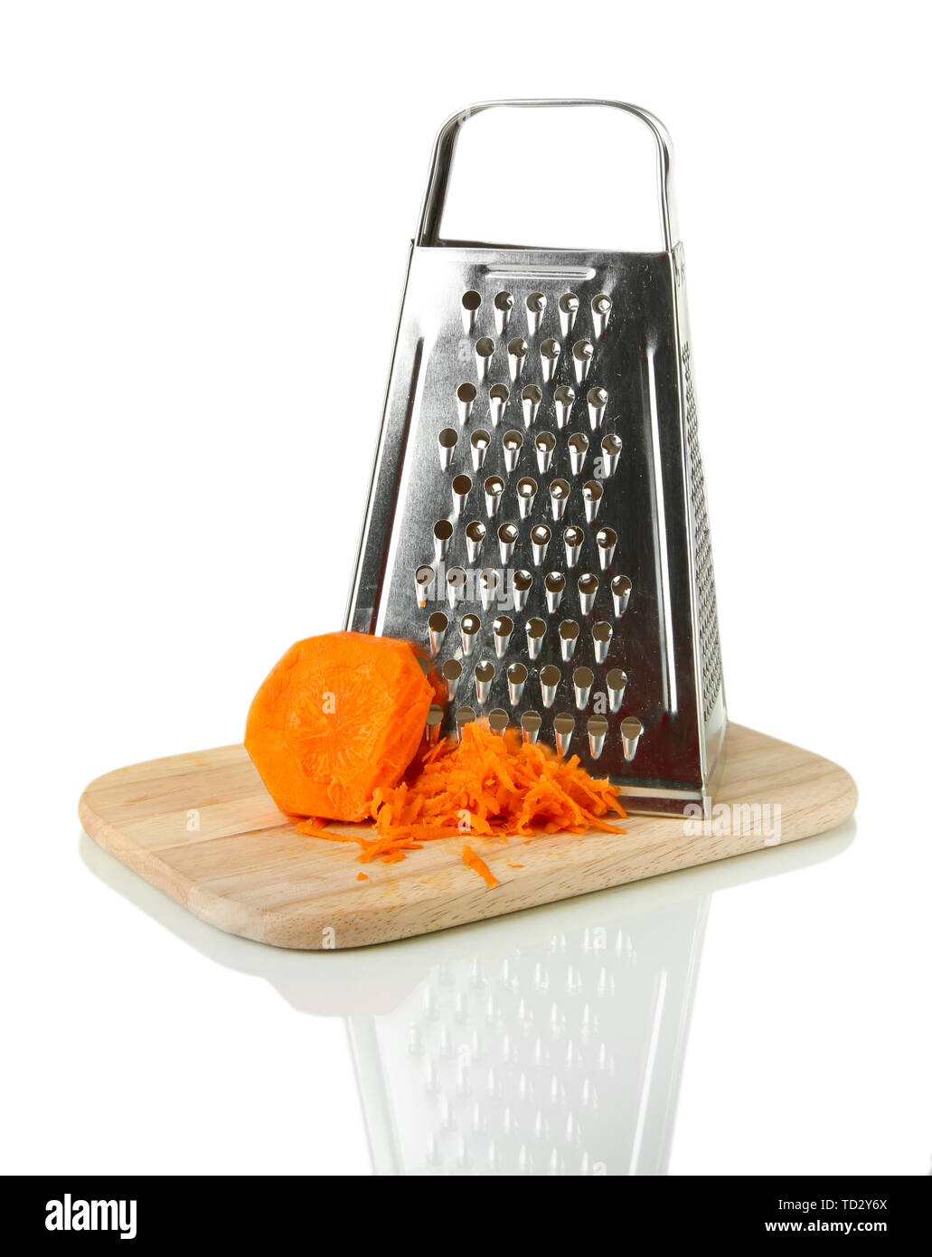 Metal grater and carrot on cutting board, isolated on white Stock Photo ...