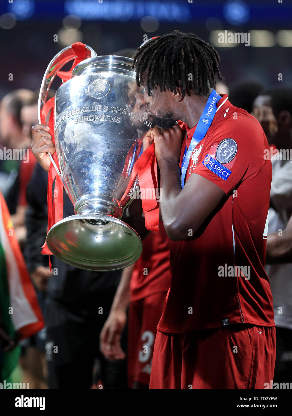 Liverpool's Divock Origi celebrates with the trophy after the UEFA ...