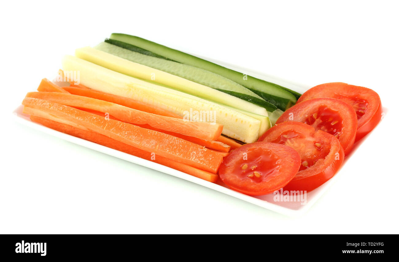 Assorted raw vegetables sticks in plate isolated on white Stock Photo ...