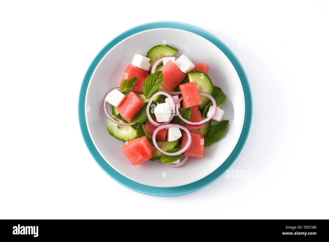 Watermelon salad with feta cheese and vegetables isolated on white ...
