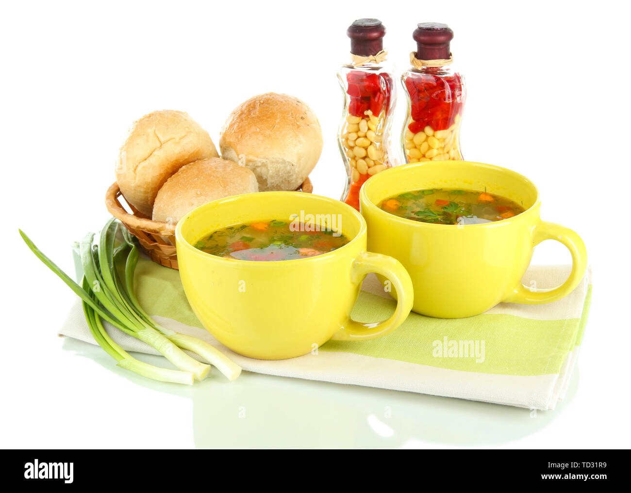 Fragrant soup in cups isolated on white Stock Photo - Alamy