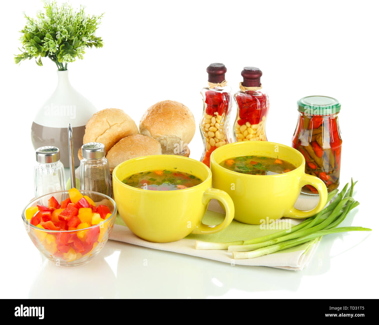 Fragrant soup in cups isolated on white Stock Photo - Alamy