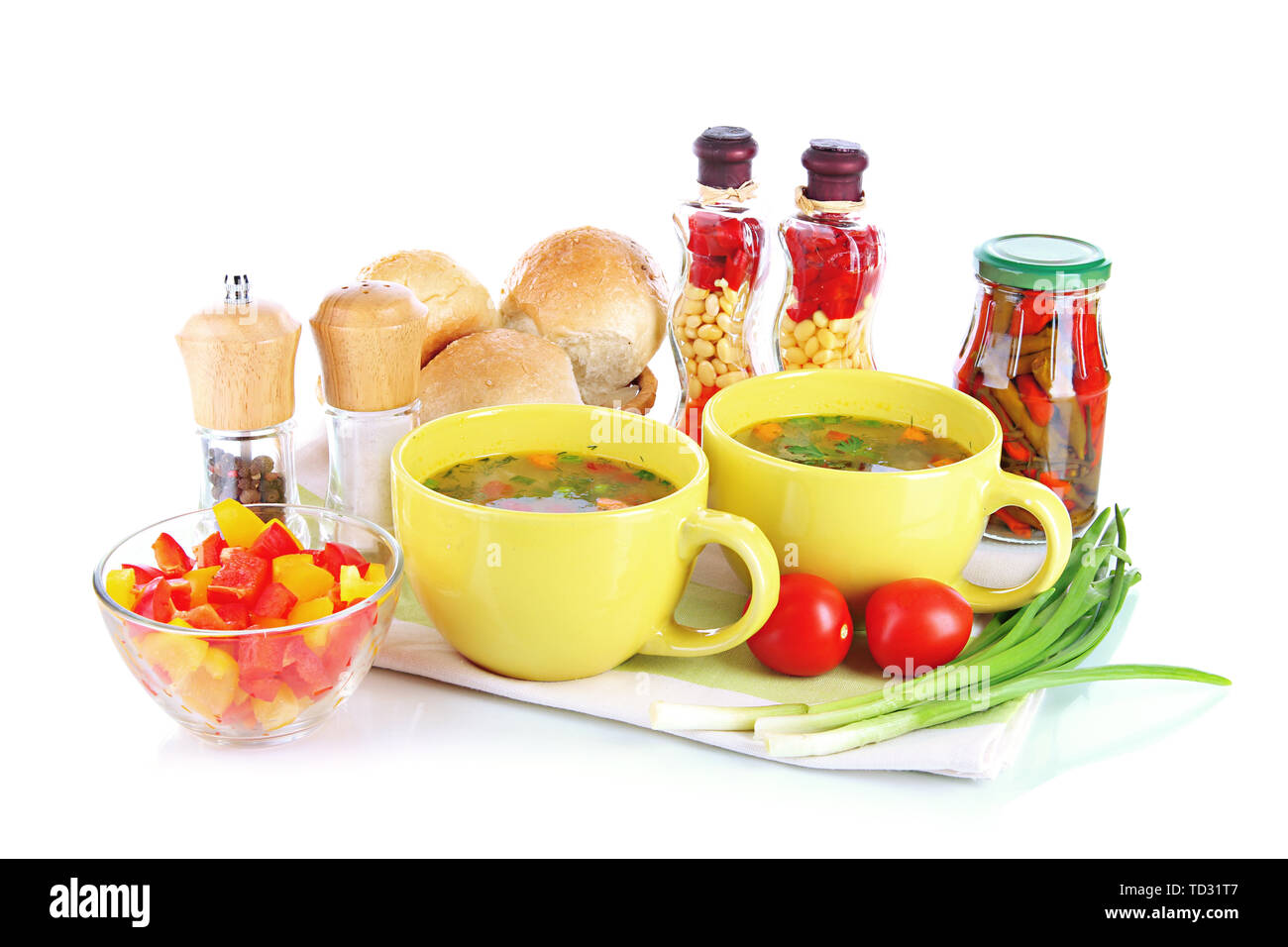 Fragrant soup in cups isolated on white Stock Photo - Alamy