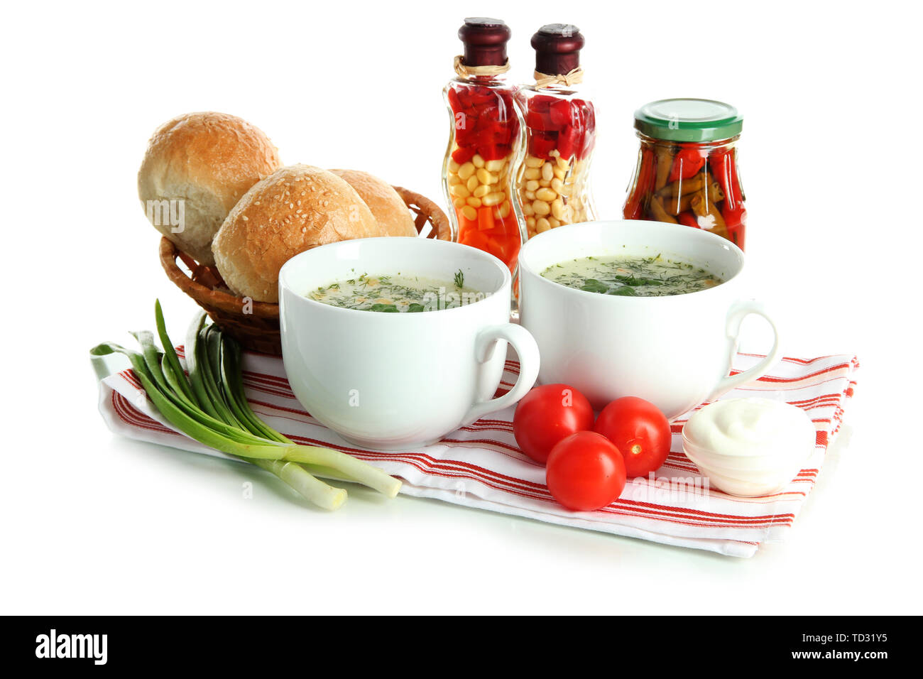 Fragrant soup in cups isolated on white Stock Photo - Alamy
