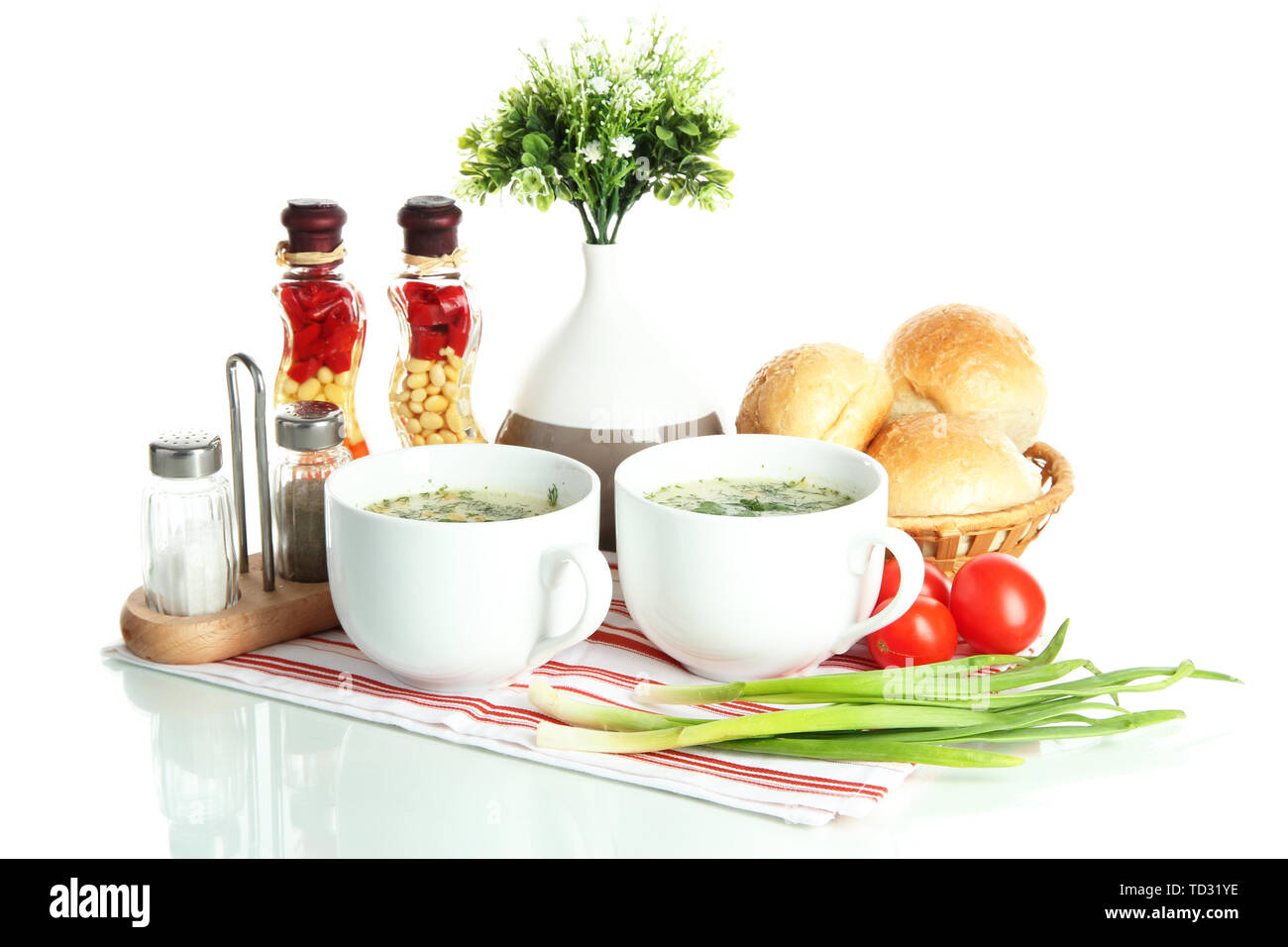 Fragrant soup in cups isolated on white Stock Photo - Alamy