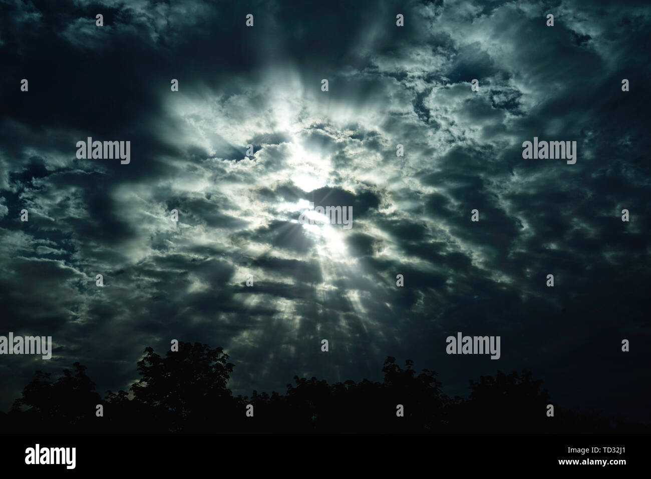 Montreal, Canada,June 7, 2019.Sun shining through storm clouds ...