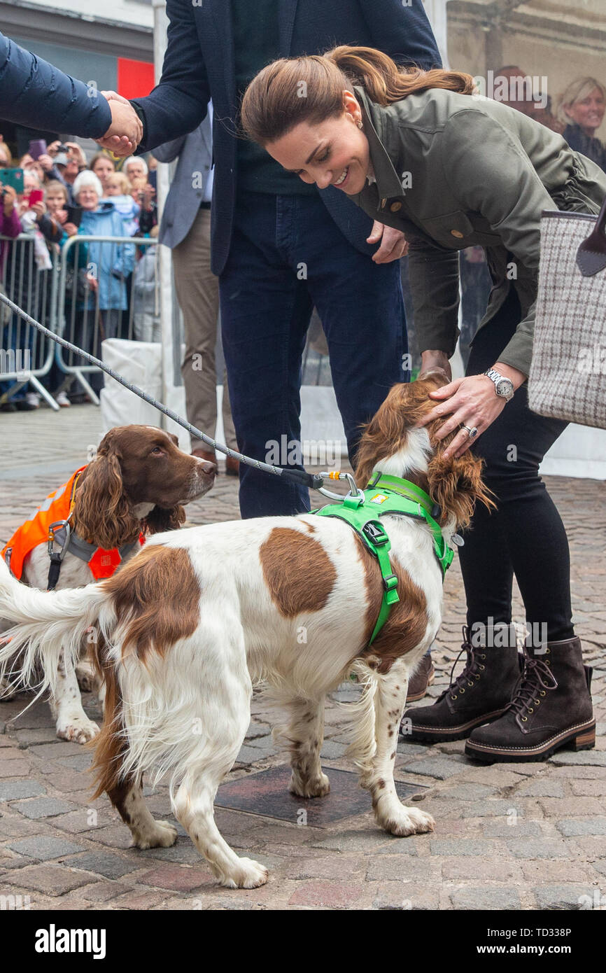 The Duchess of Cambridge meets three dogs Max, Paddy, and Harry, as she ...