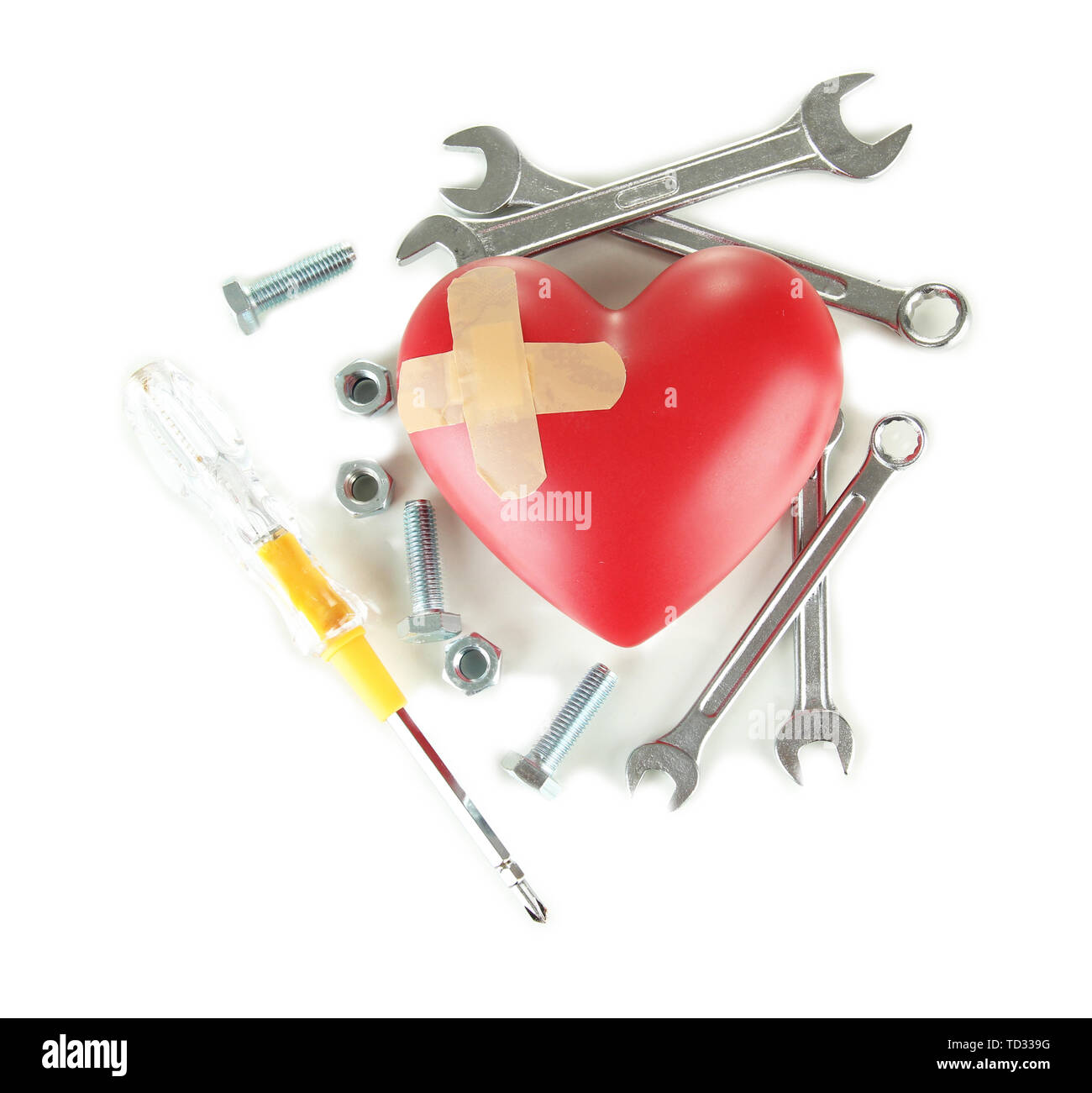 Heart and tools. Concept: Renovation of heart. Isolated on white Stock ...