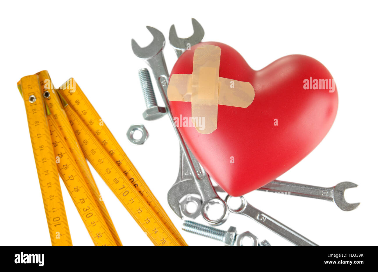 Heart and tools. Concept: Renovation of heart. Isolated on white Stock ...