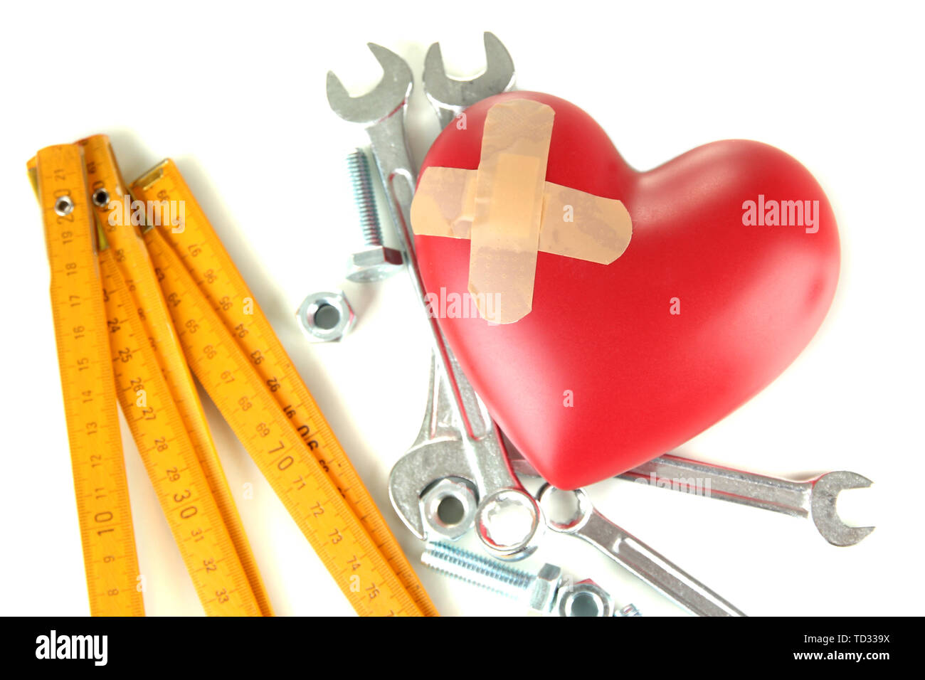 Heart and tools. Concept: Renovation of heart. Isolated on white Stock ...