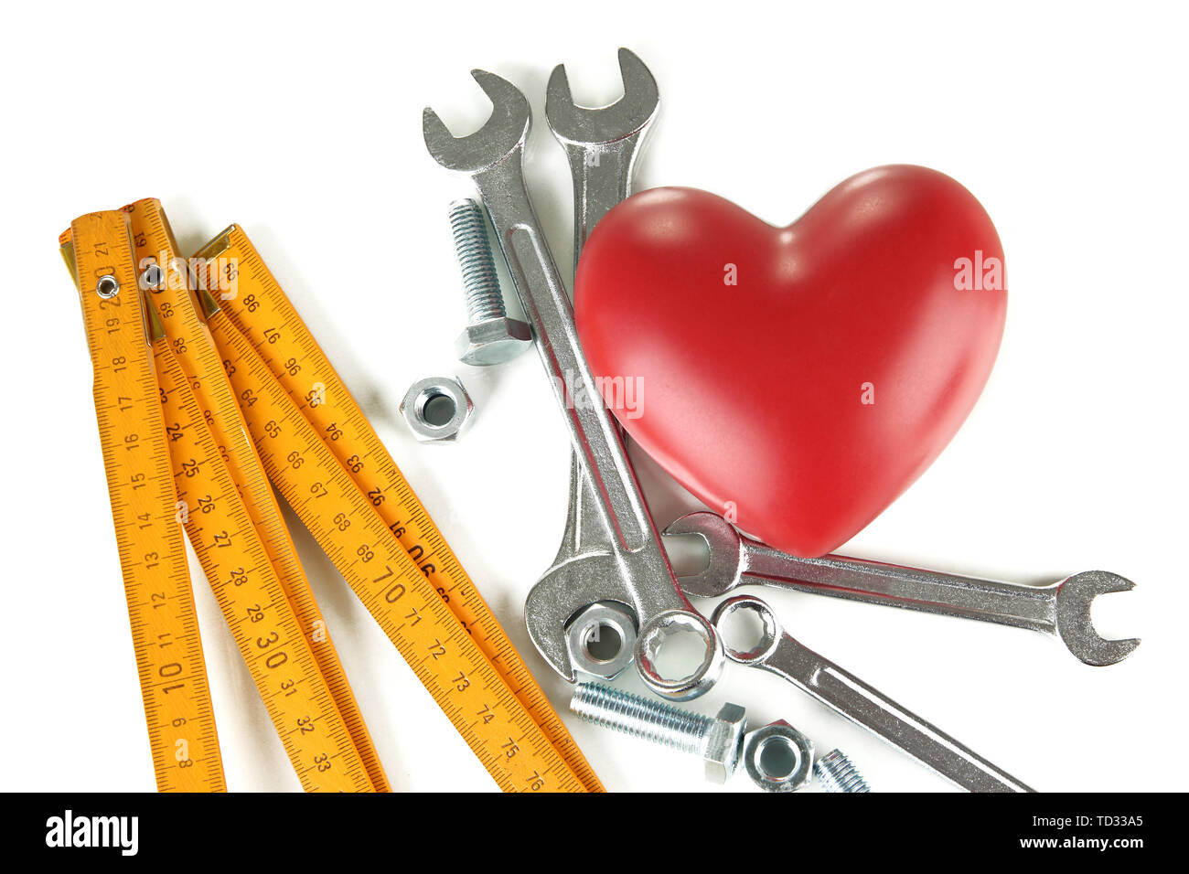 Heart and tools. Concept: Renovation of heart. Isolated on white Stock ...