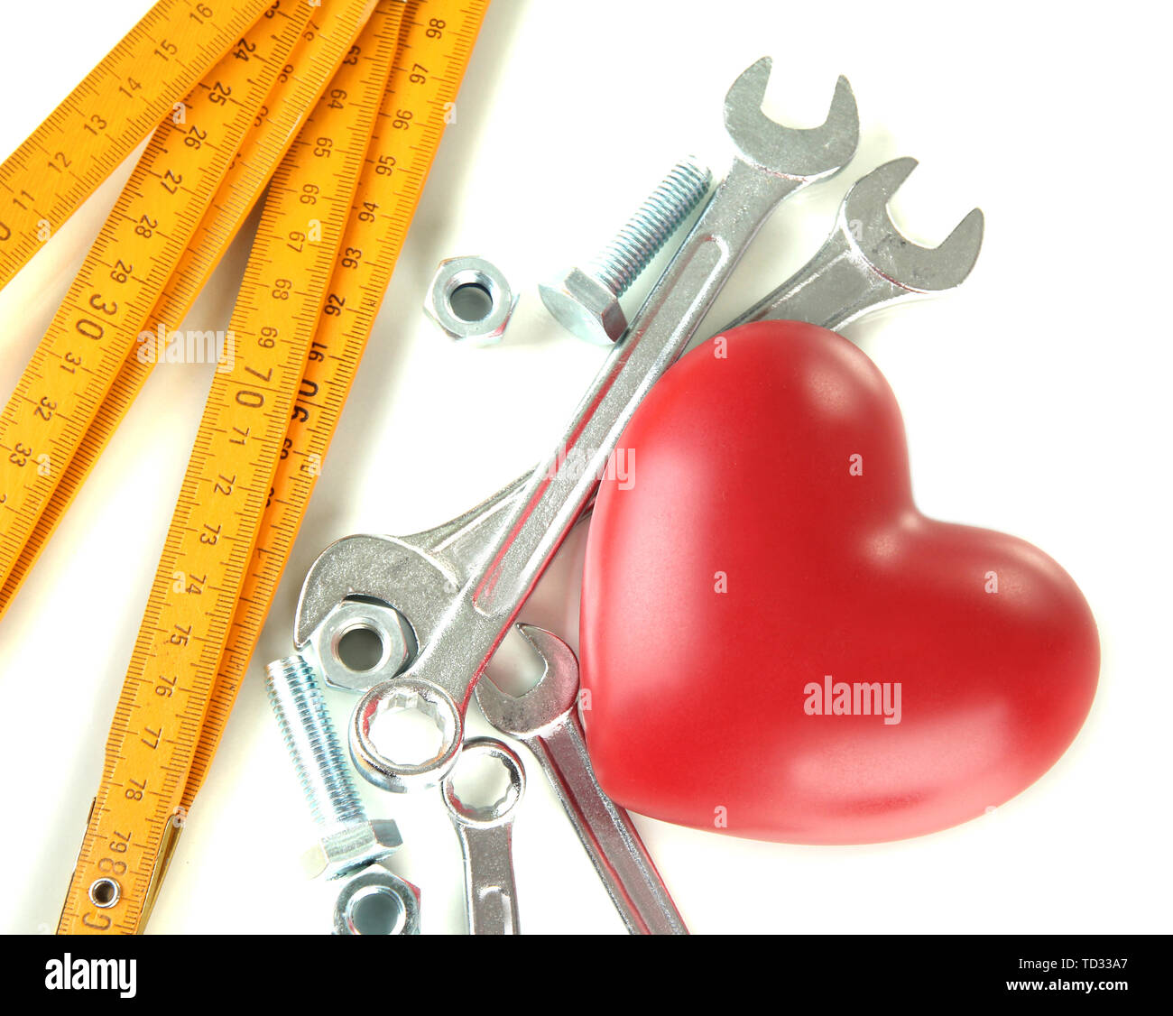 Heart and tools. Concept: Renovation of heart. Isolated on white Stock ...