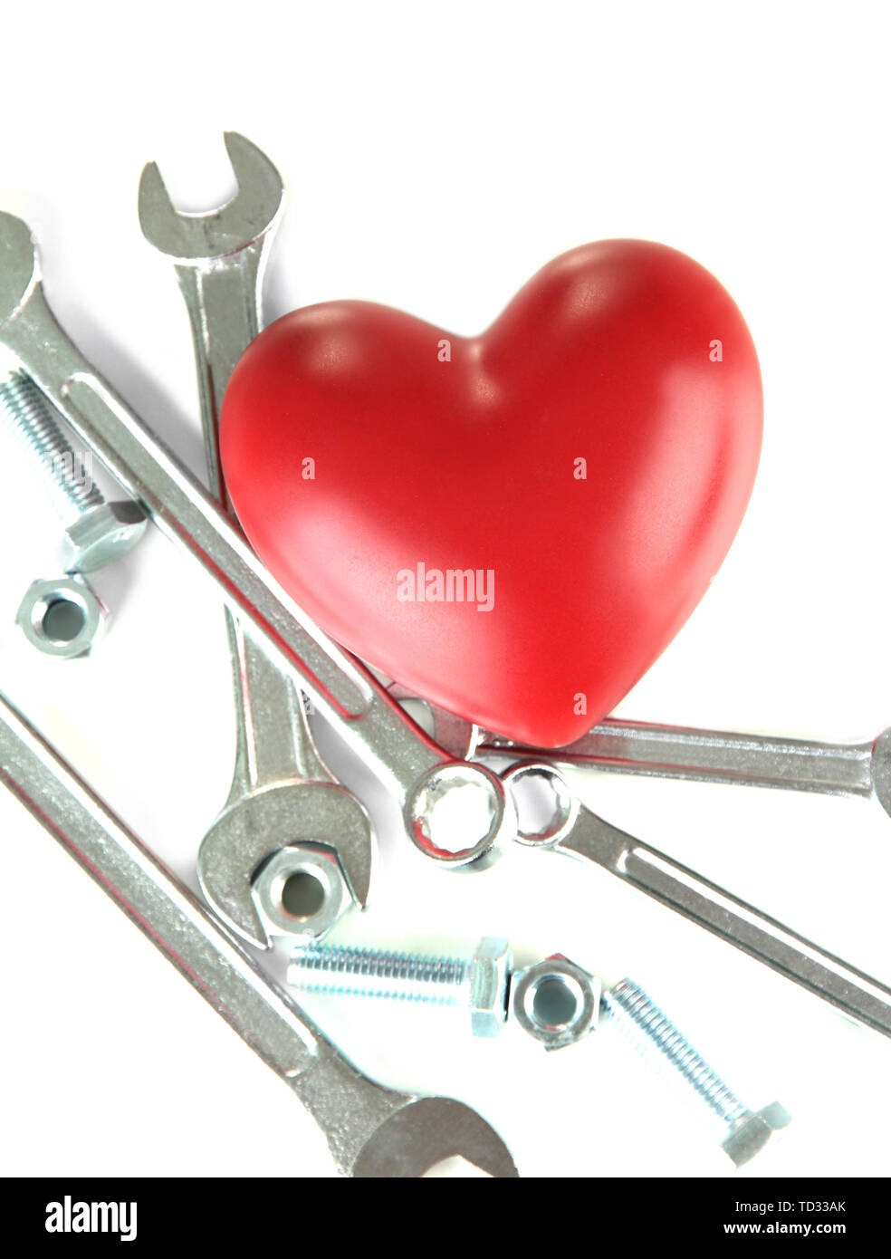 Heart and tools. Concept: Renovation of heart. Isolated on white Stock ...
