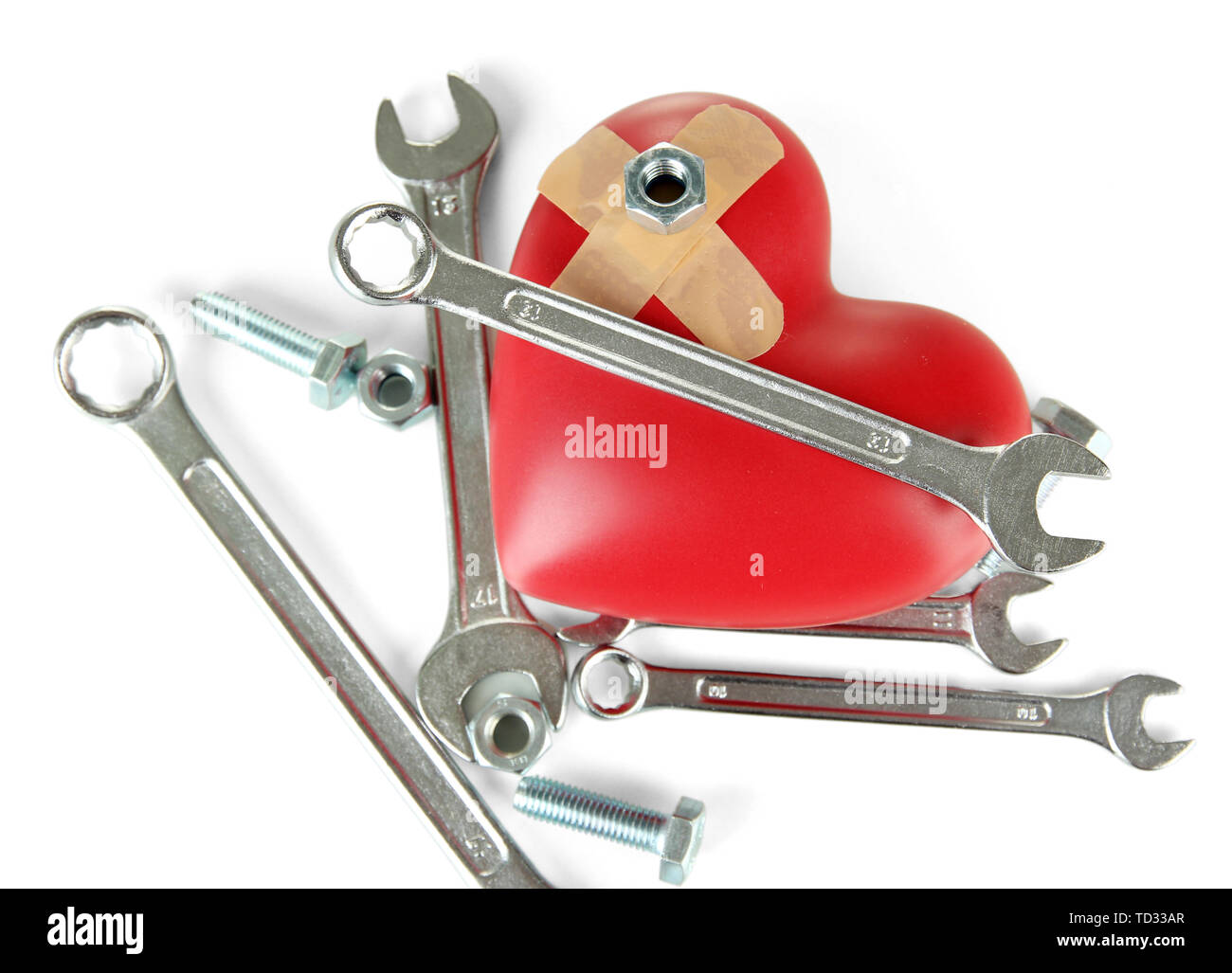 Heart and tools. Concept: Renovation of heart. Isolated on white Stock ...