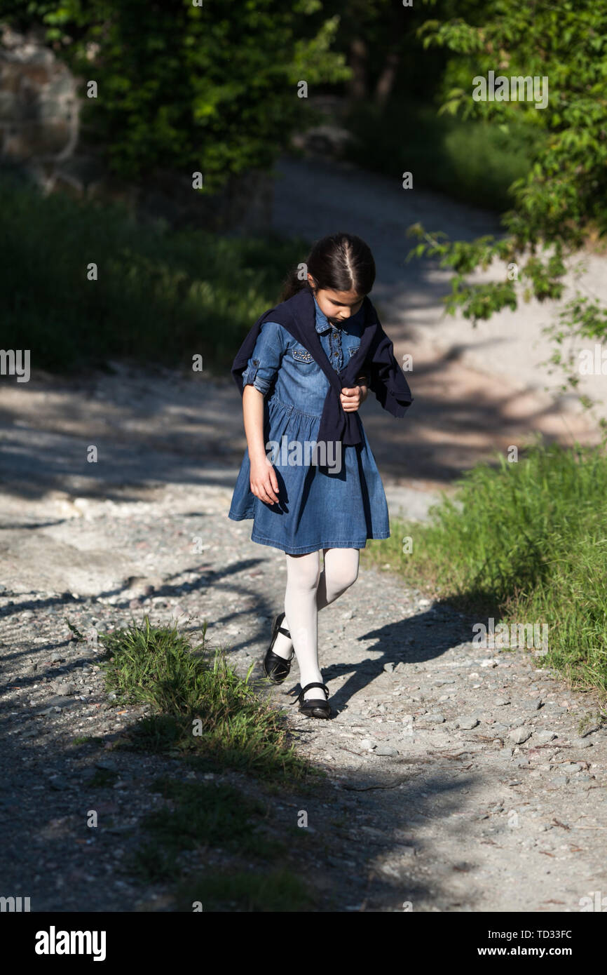 Child walking alone sad hi-res stock photography and images - Alamy