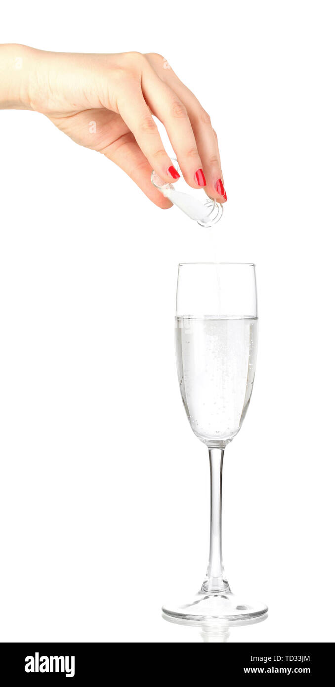 Pour something into glass with drink isolated on white Stock Photo - Alamy