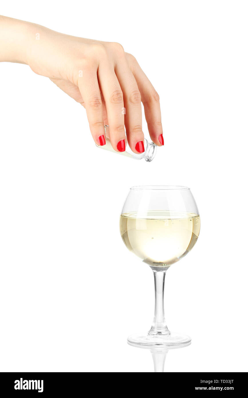 Pour something into glass with drink isolated on white Stock Photo - Alamy