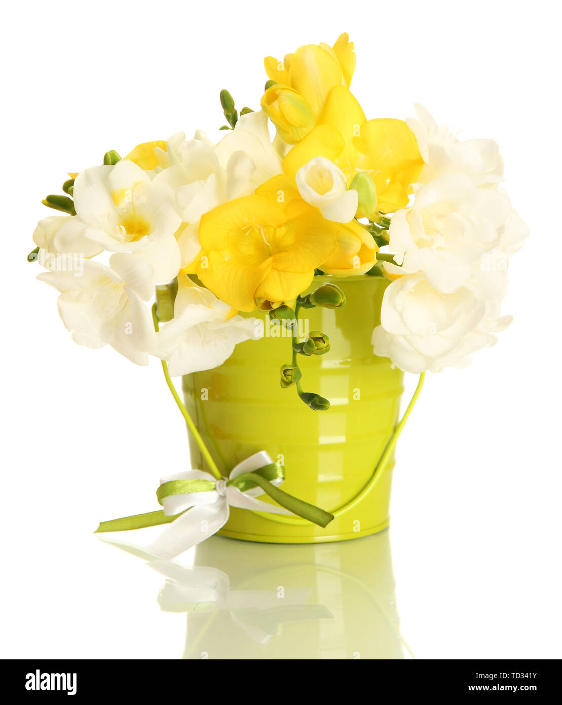 Beautiful bouquet of freesias in pail, isolated on white Stock Photo ...