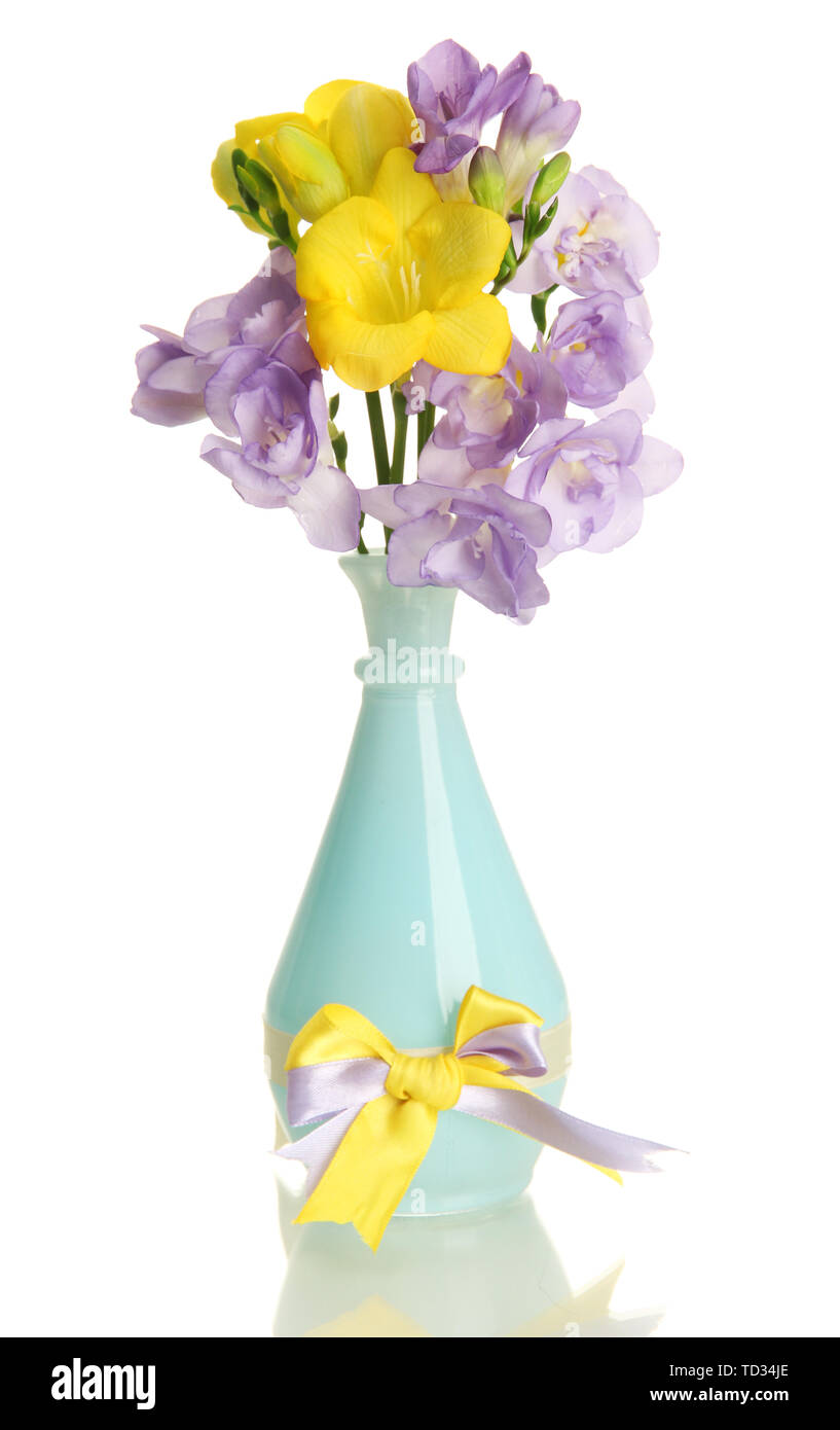 Beautiful bouquet of freesias in vase, isolated on white Stock Photo ...