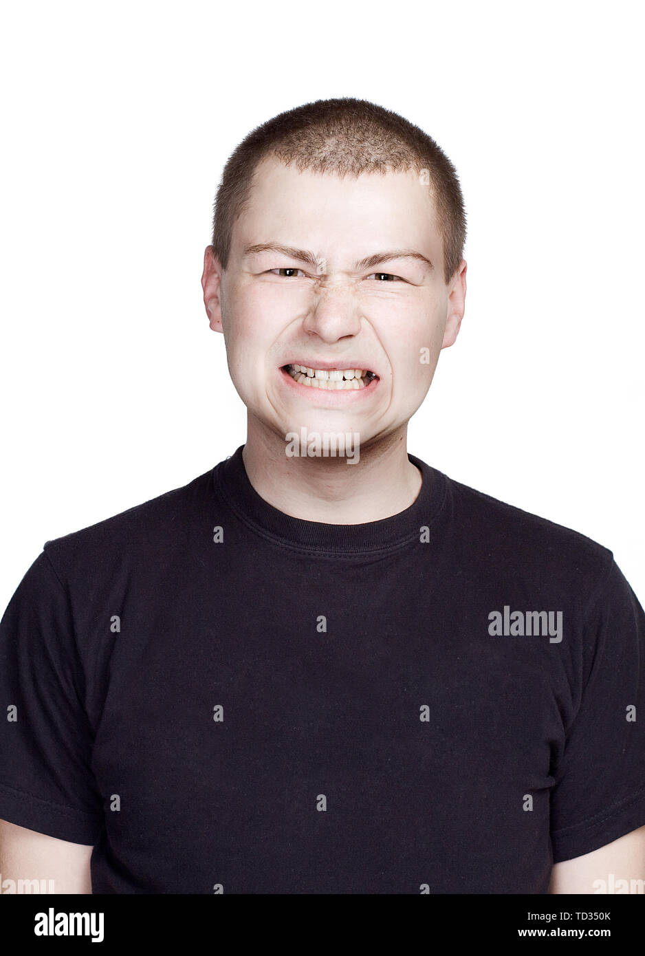 Portrait of young man. Facial expression. Teeth face Stock Photo - Alamy