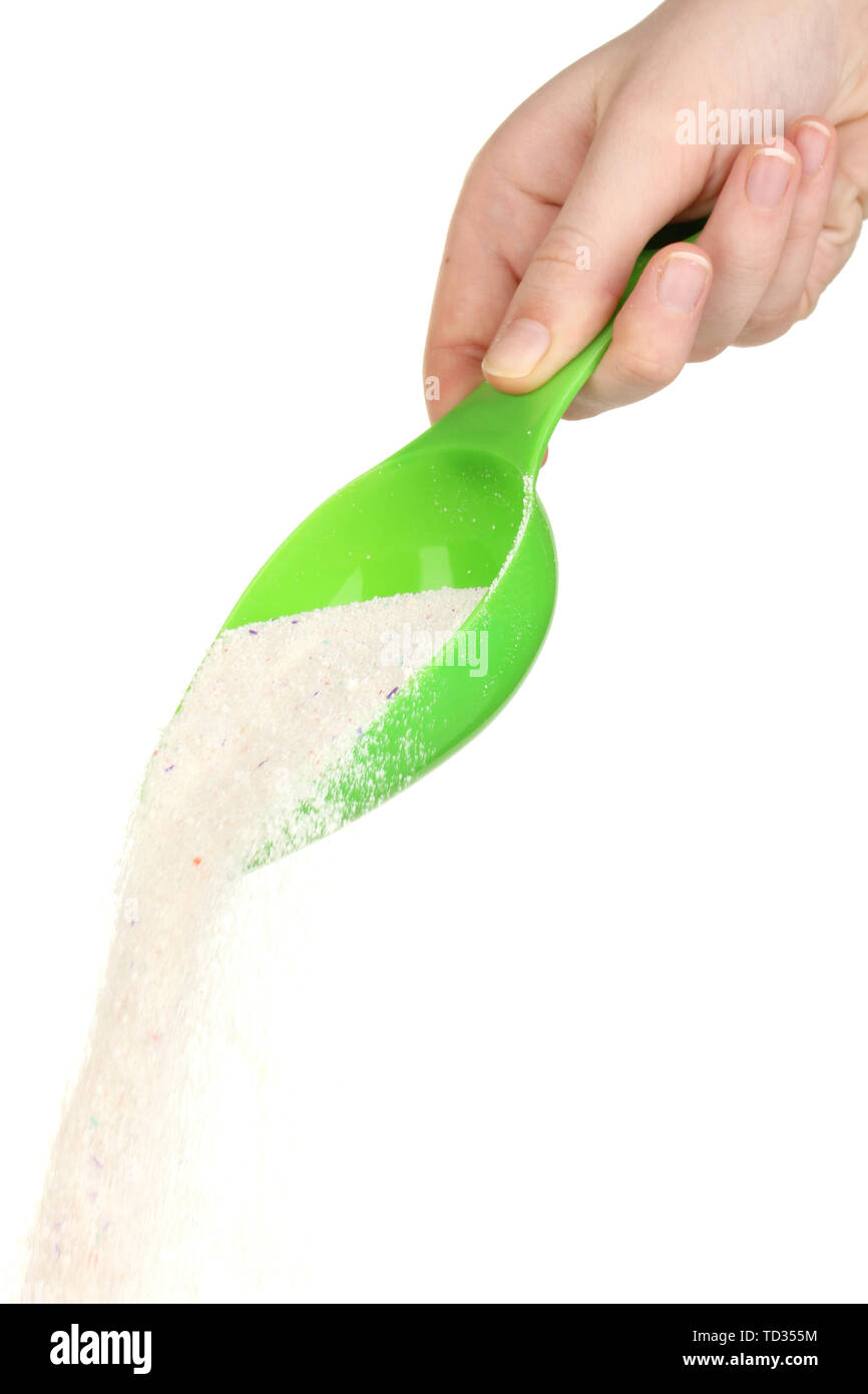Measuring cup with washing powder in hand isolated on white Stock Photo ...
