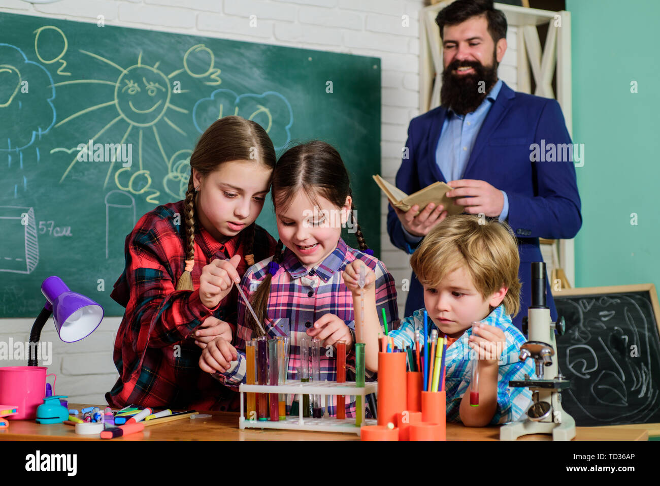 children making science experiments. Education. Science and education ...