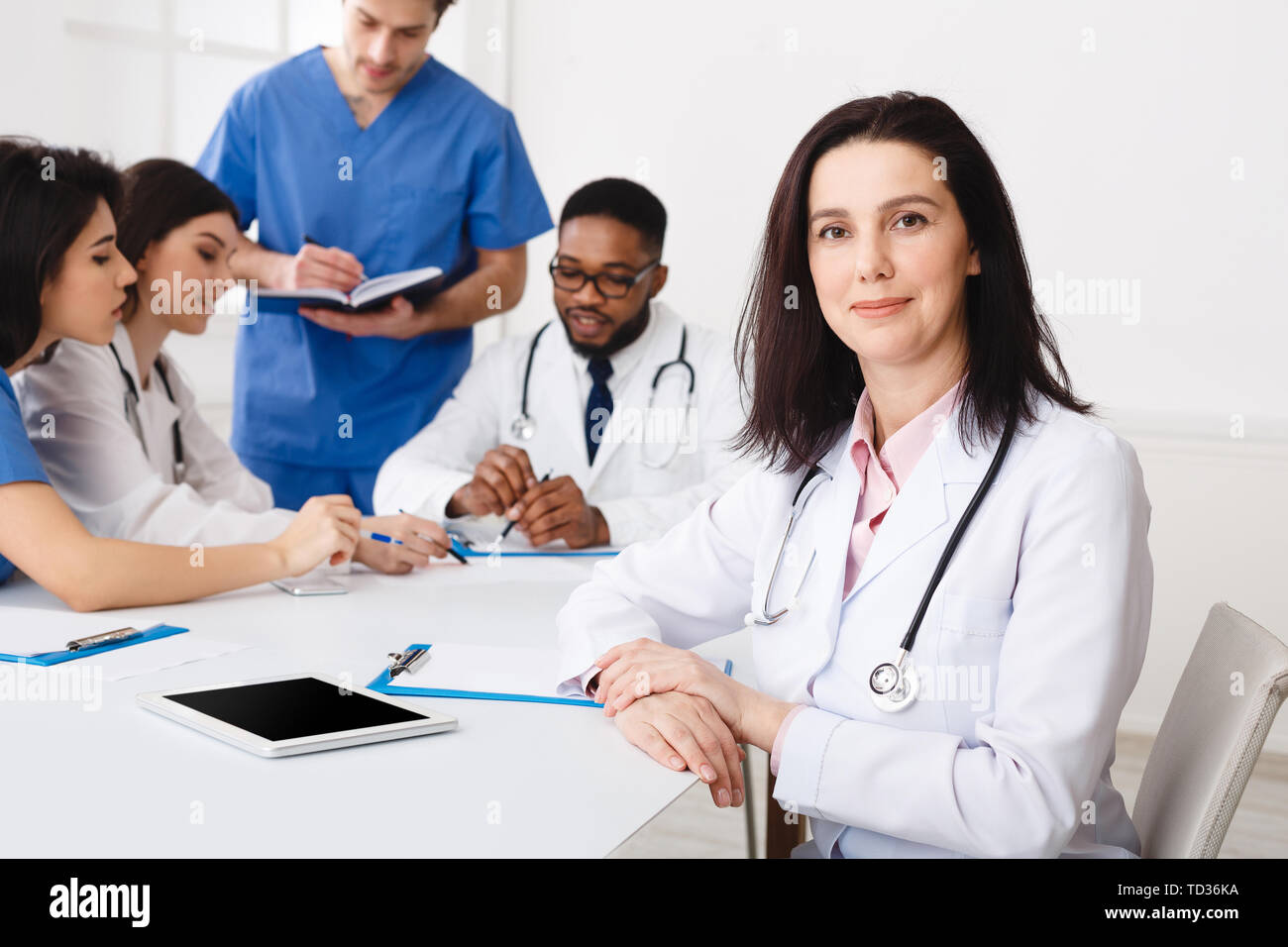 Medical Team Conference. Female Practitioner At Meeting Stock Photo - Alamy