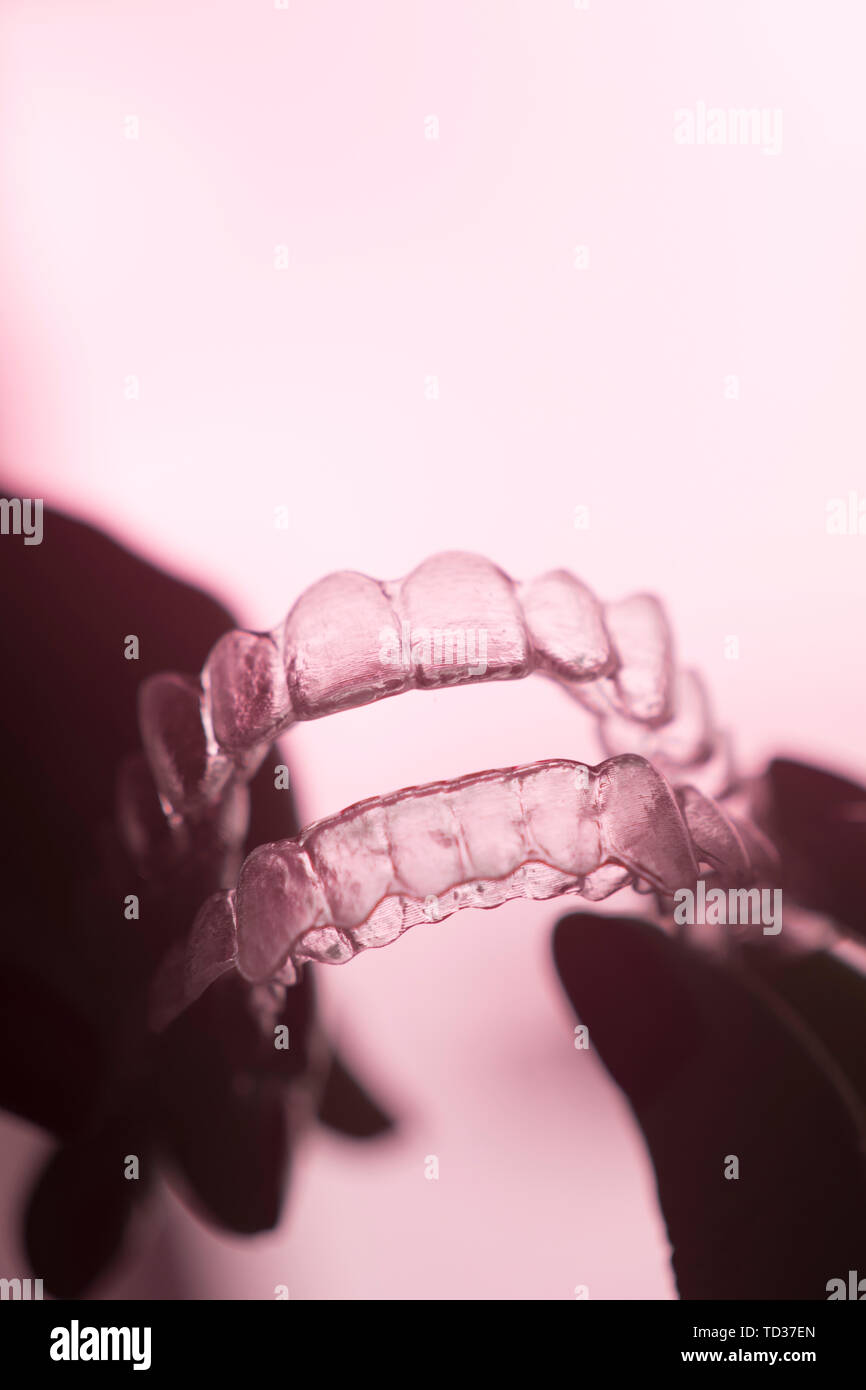 Clear dental teeth retainer brackets to straighten and align each tooth ...