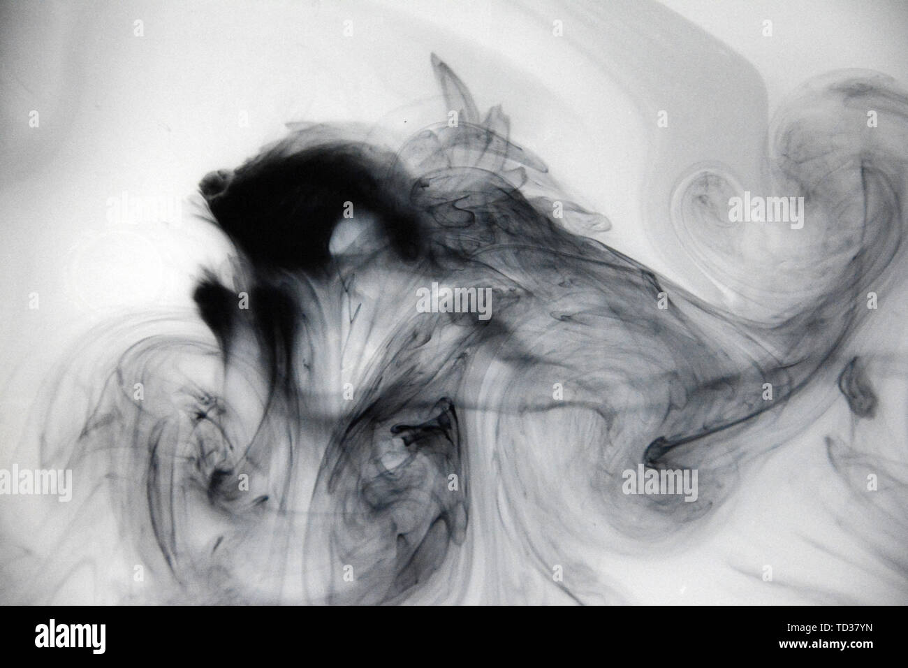 Ink background, ink flowing in water Stock Photo - Alamy