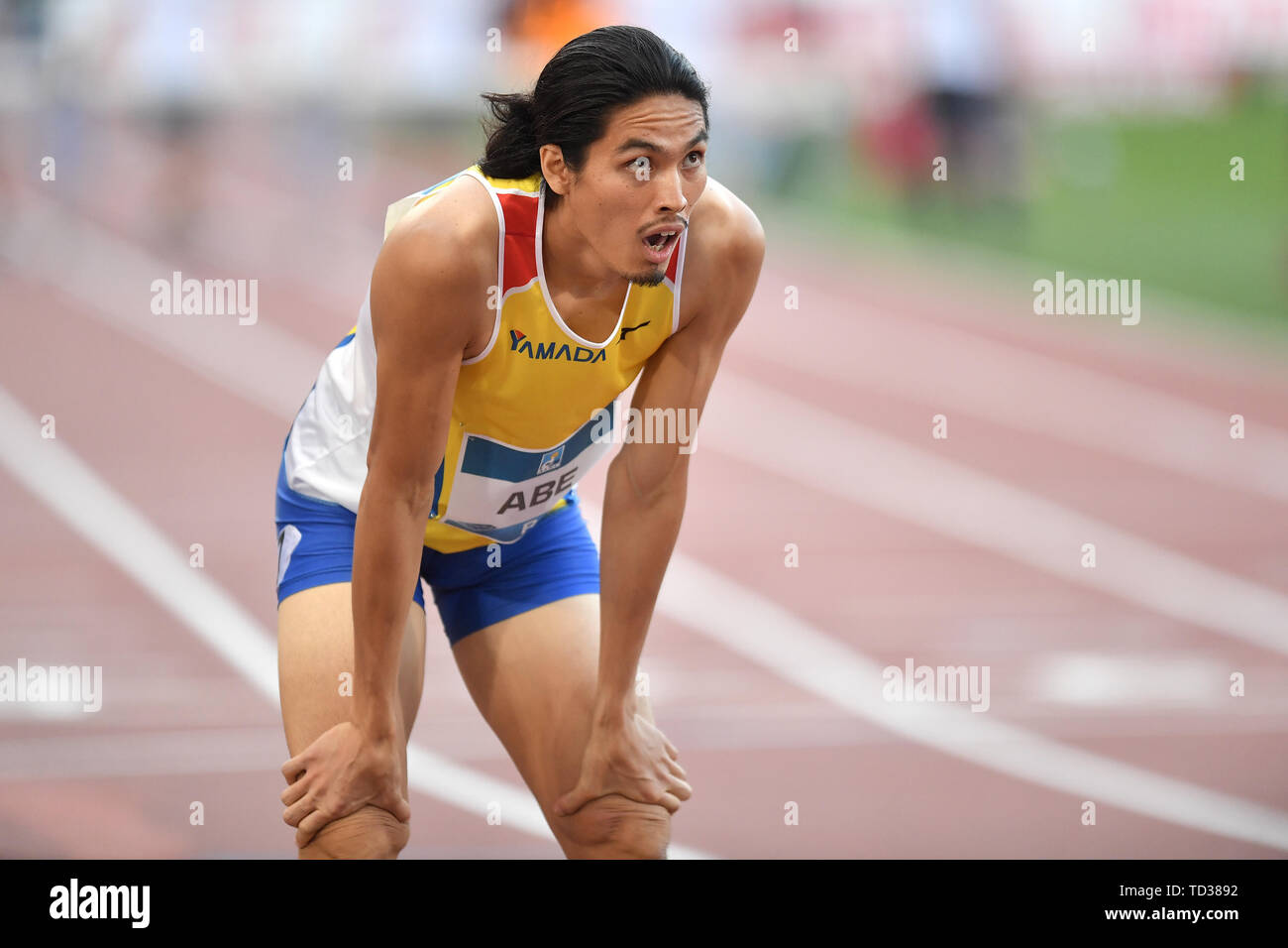 Takatoshi Abe of Japan reacts after the men's 400m hurdles at the IAAF ...