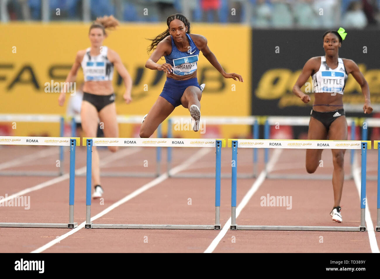 Dalilah Muhammad of United States competes to win in the women's 400m ...
