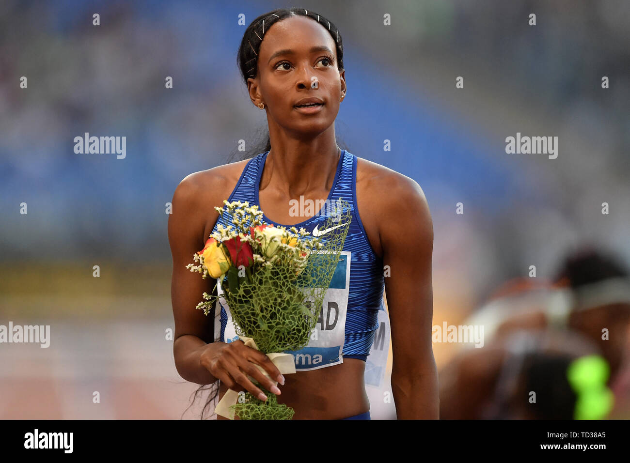Dalilah Muhammad of United States looks to the results after winning ...