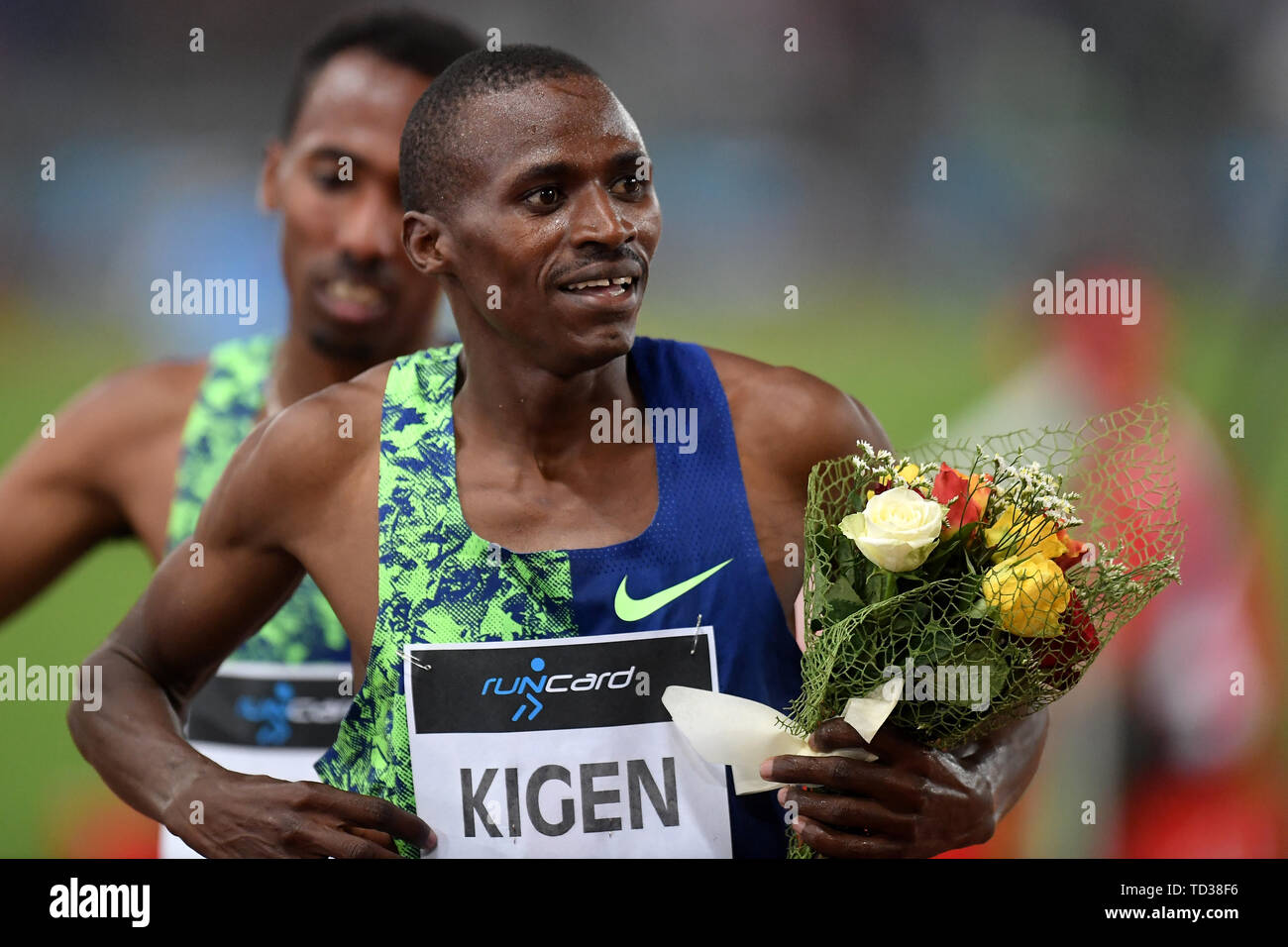 Benjamin Kigen of Kenia reacts after winning the men's 3000m ...