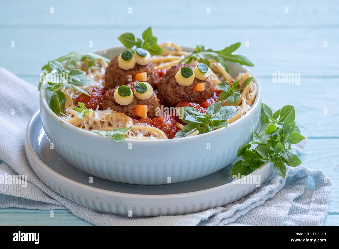 Pasta spaghetti with funny meatballs for kids. Birds in nests Stock ...